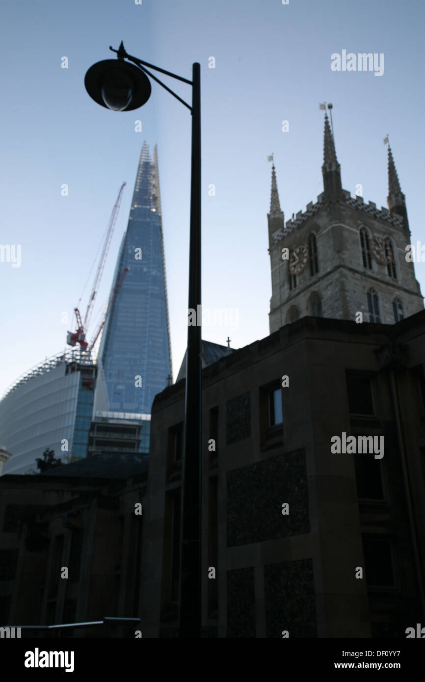 The London Shard and a street lamp in the early morning light with ...