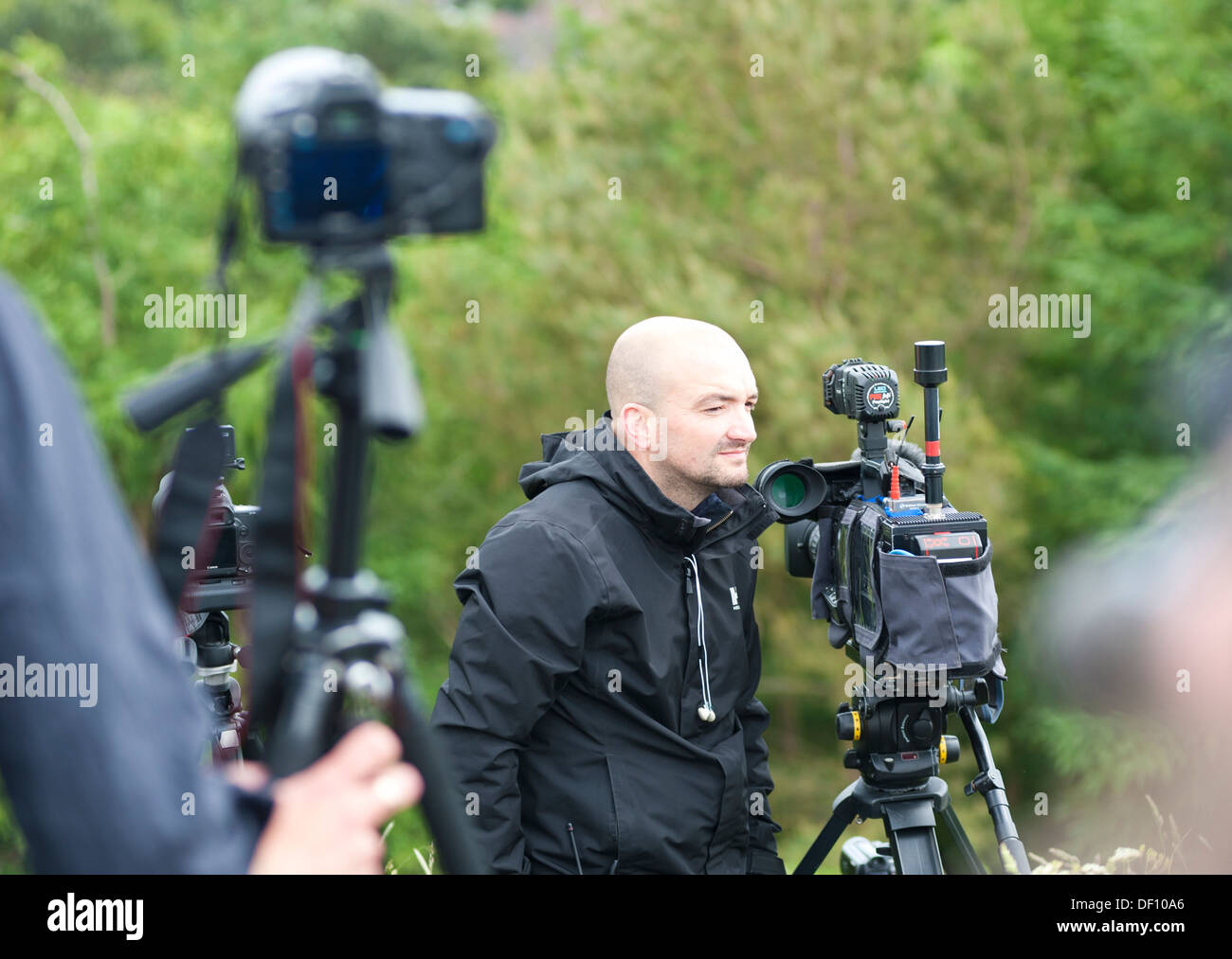 Cameras and camera man Stock Photo - Alamy