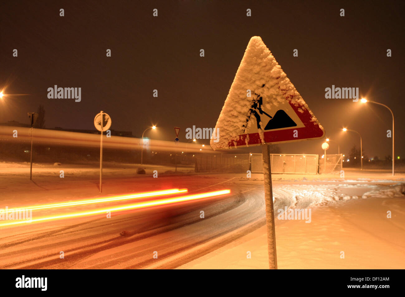 Schoenefeld, Germany, snowy streets and street signs Stock Photo - Alamy