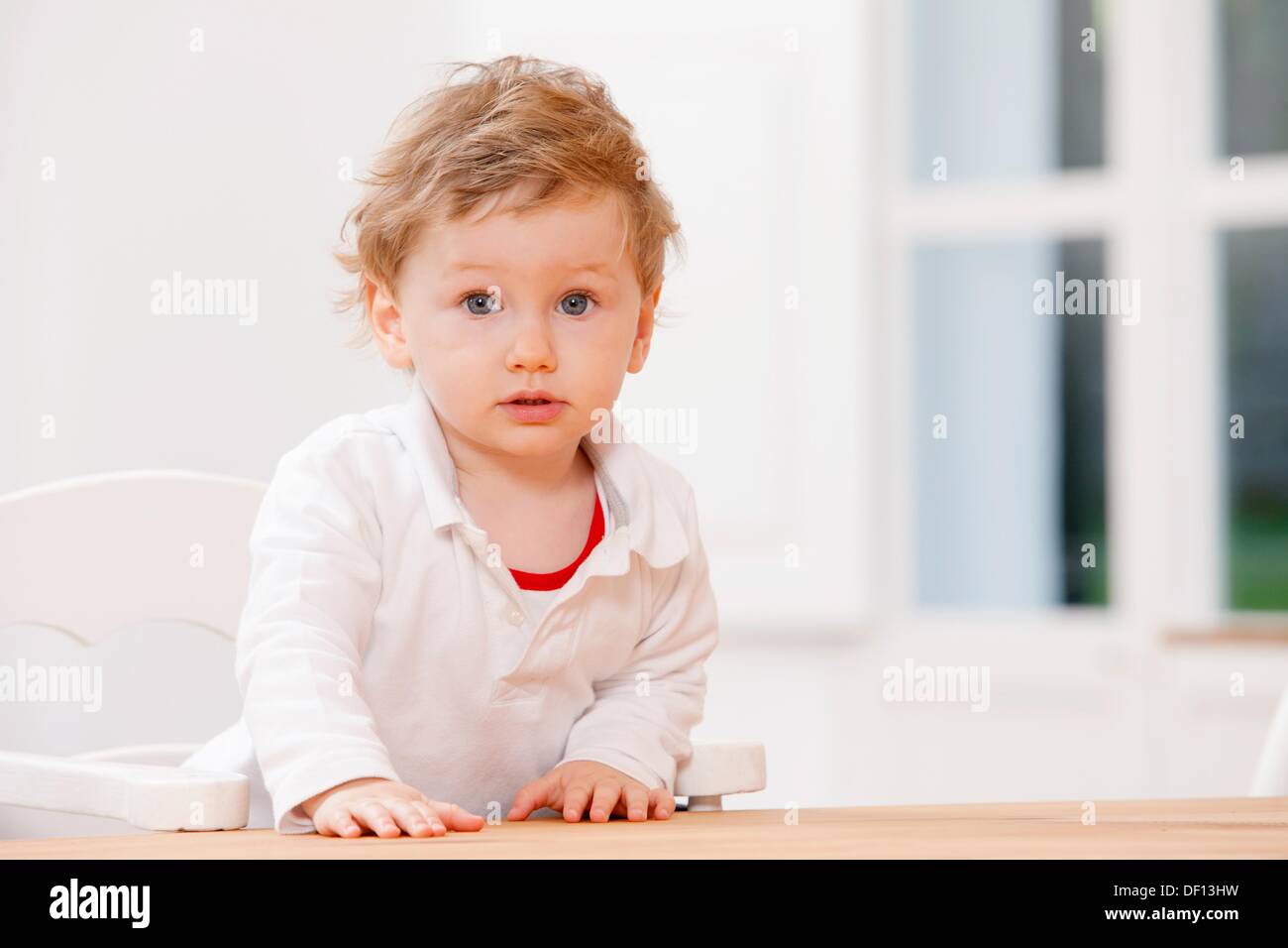 Boy in a high chair hi-res stock photography and images - Alamy