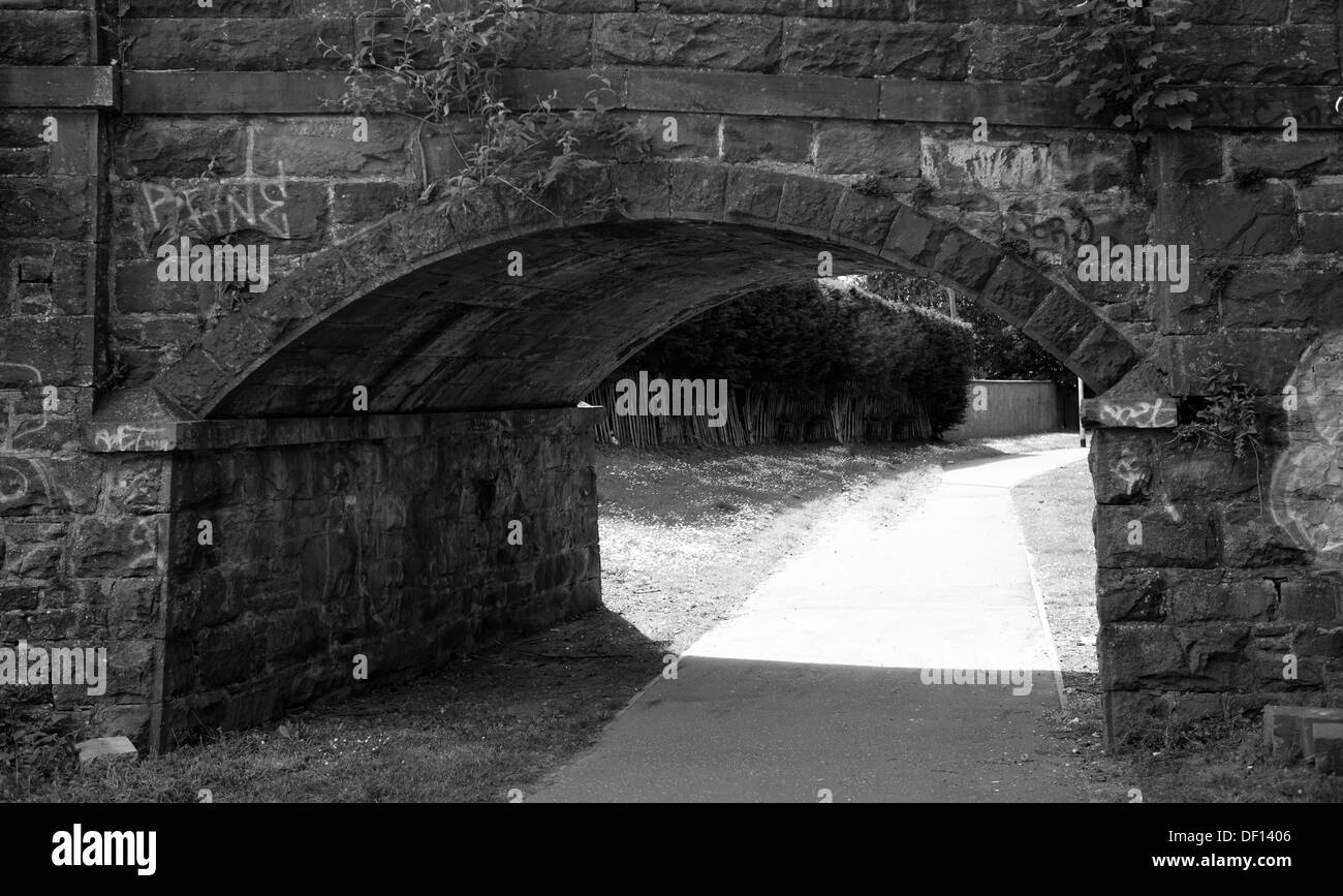old railway bridge with spray paint graffiti black and white Stock ...