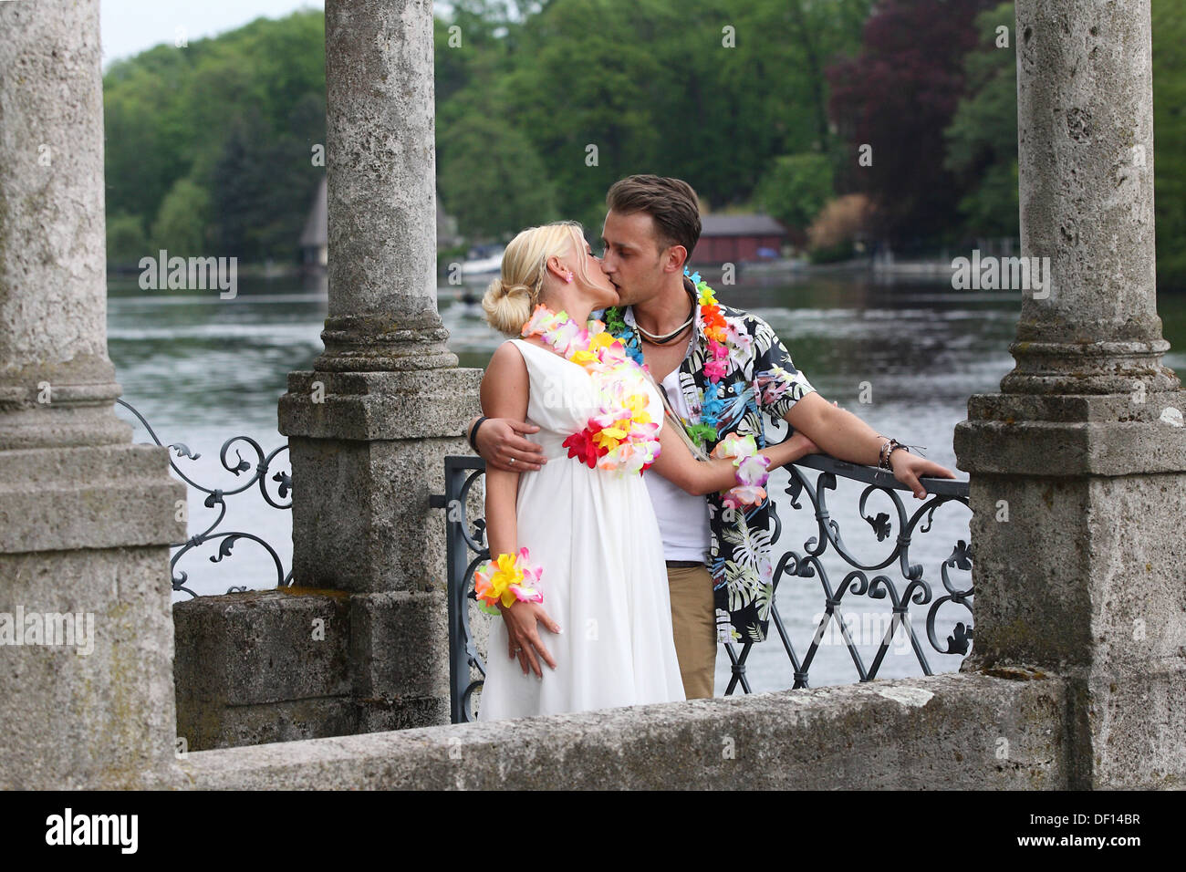 Berlin, Germany, a newlywed bride and groom kiss your Stock Photo - Alamy
