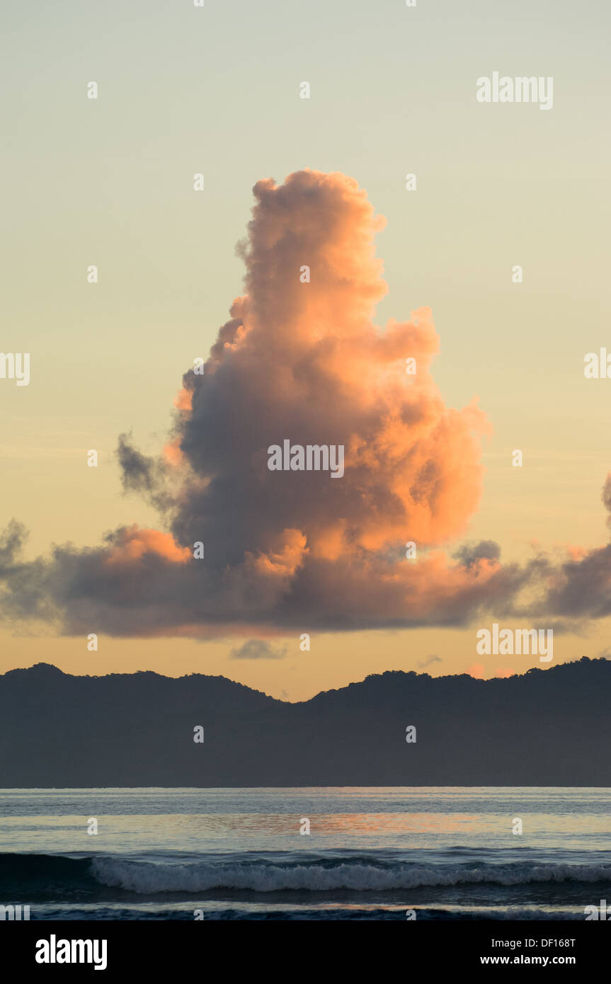 Cloud formation above Maewo Island at sunset, across the Coral Sea from ...