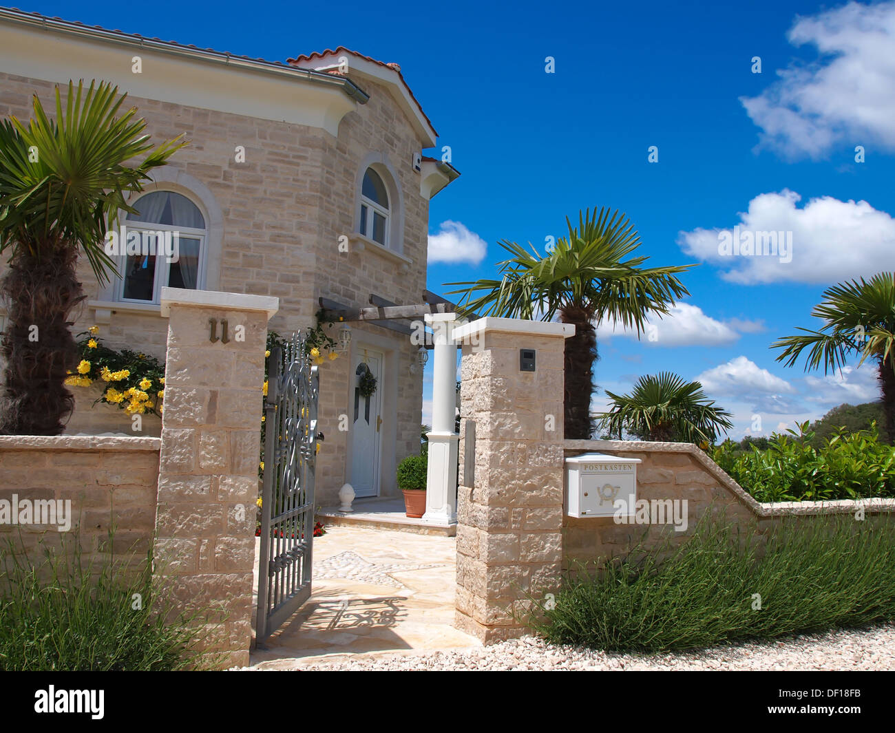stone house with mail box Stock Photo - Alamy