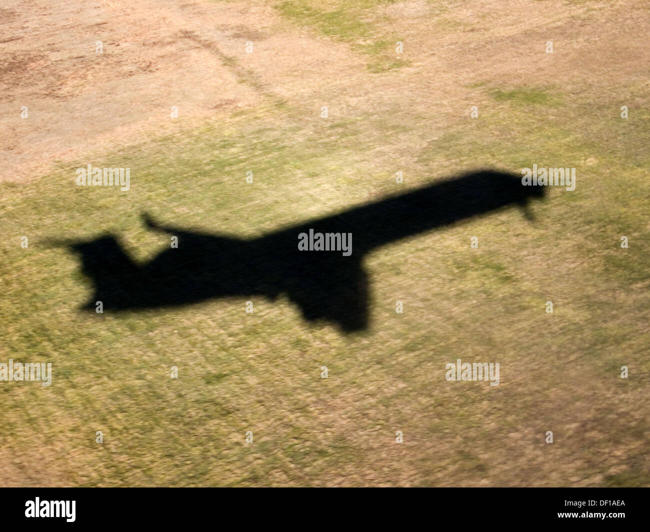 Shadow of an airplane landing hi-res stock photography and images - Alamy