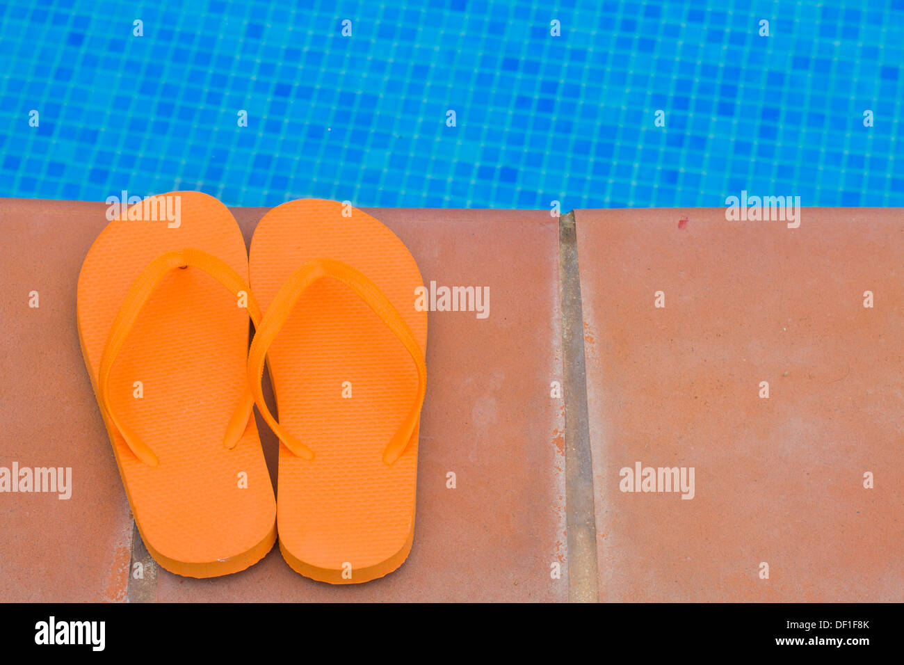 flip flops on pool side Stock Photo - Alamy