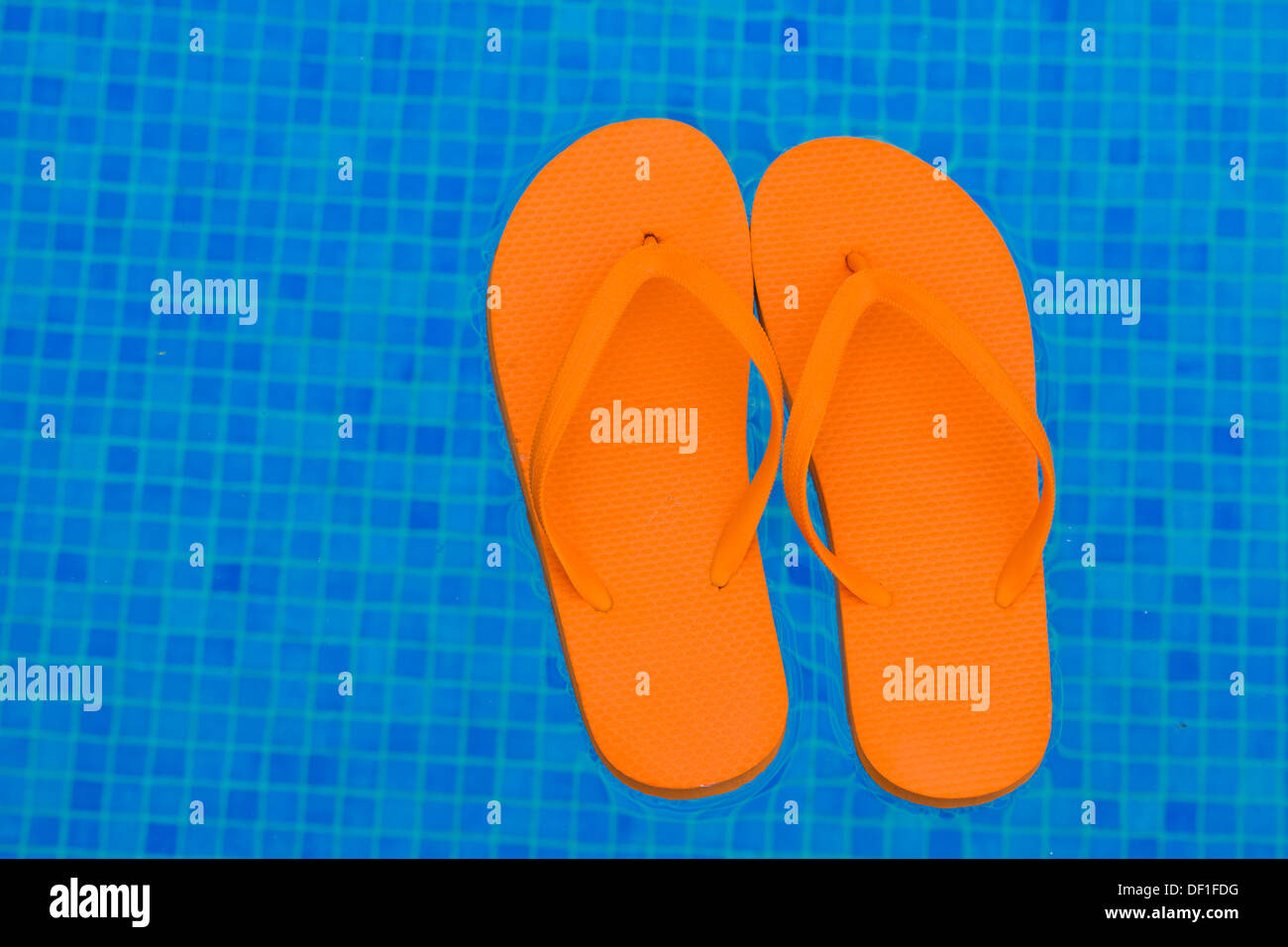 flip flops in pool water Stock Photo - Alamy