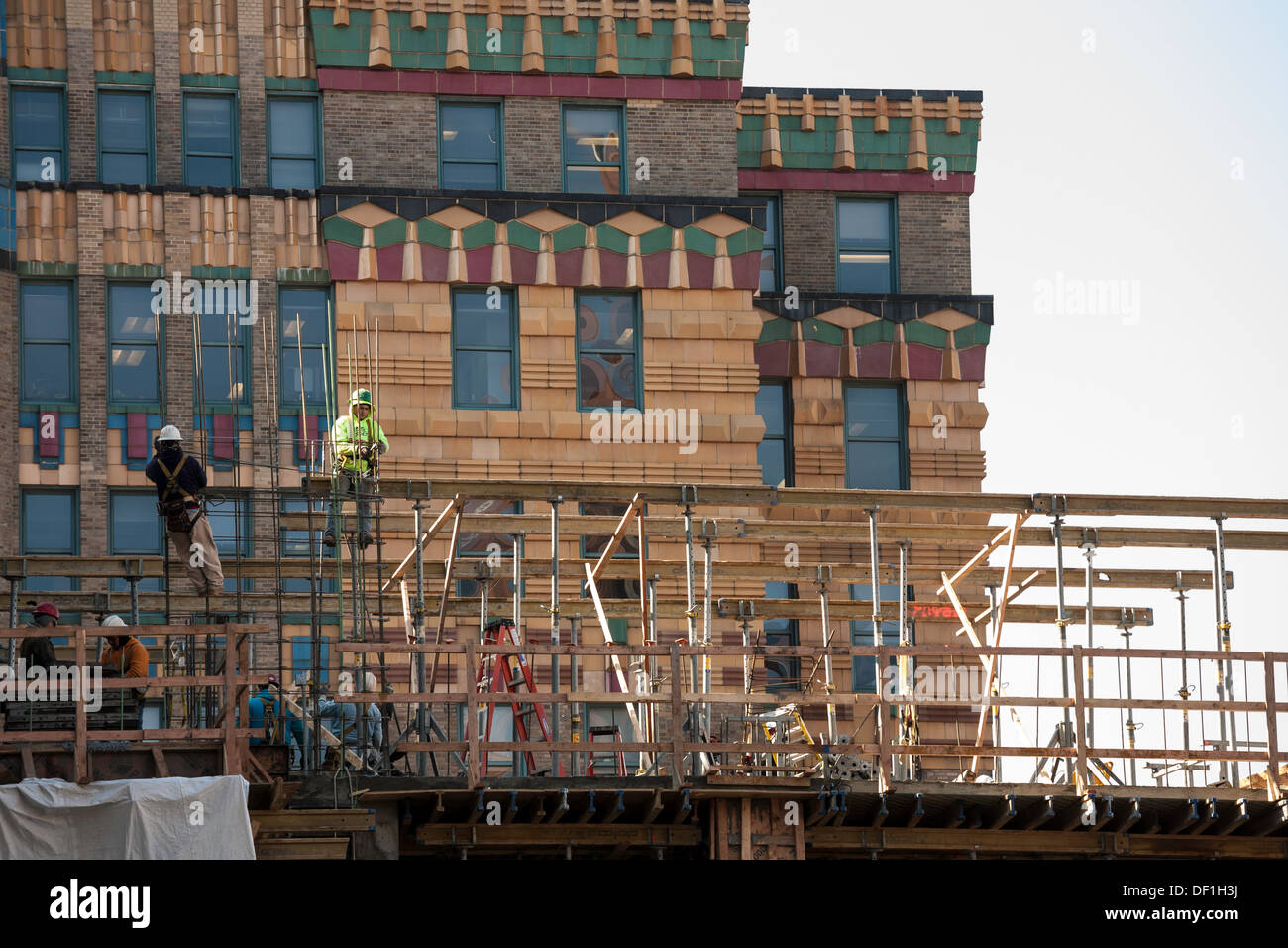 High-rise Building Construction Site with Tradesmen, NYC, USA Stock ...