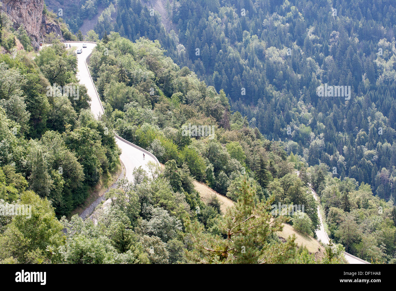 tight narrow mountain road steep forest trees Stock Photo - Alamy