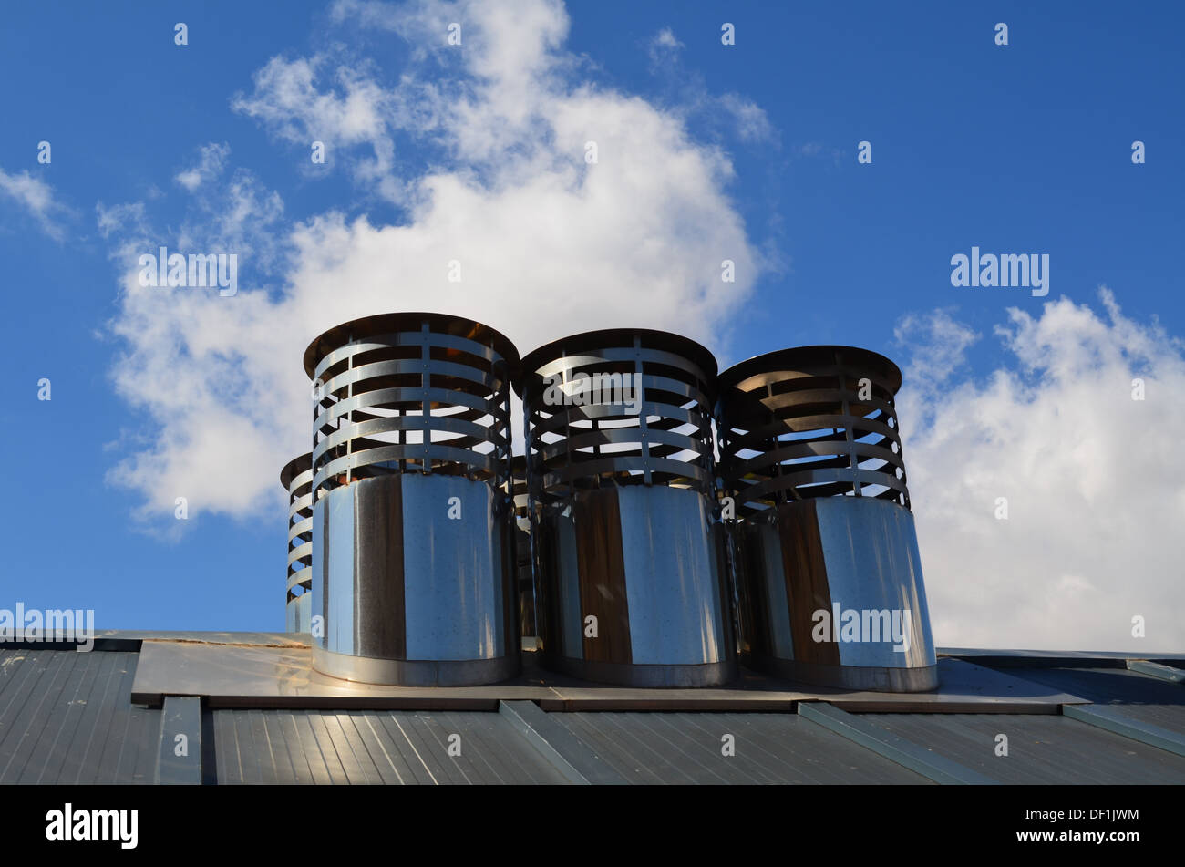 Modern roof top ventilation chimney Stock Photo - Alamy
