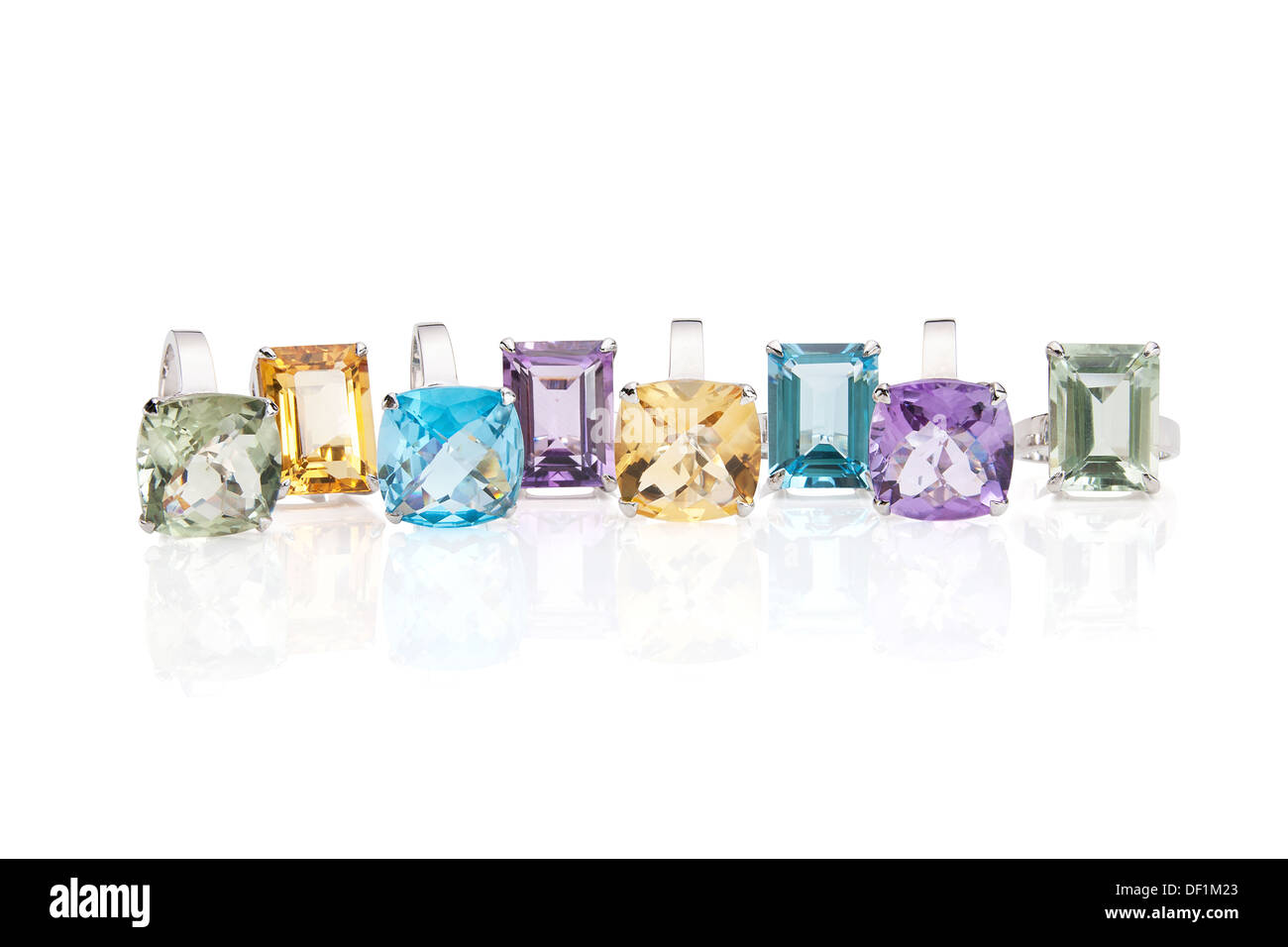 large coloured stones set in white gold rings group shot. cocktail ...