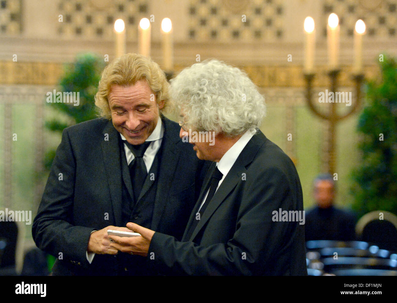 Andrew Ranicki (R), the son of late literature critic Marcel Reich ...