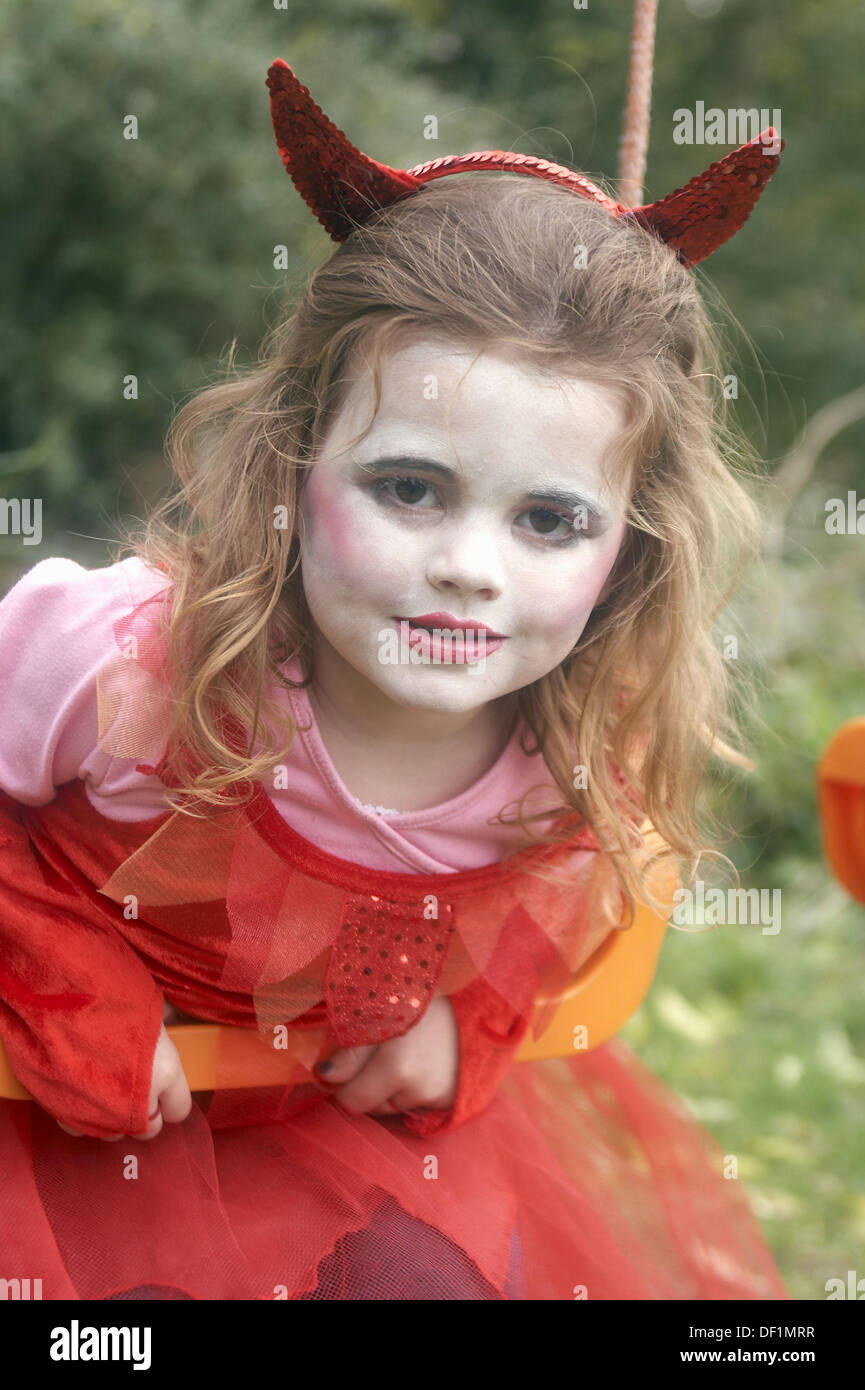 Child dressed as a devil child costume hi-res stock photography and ...