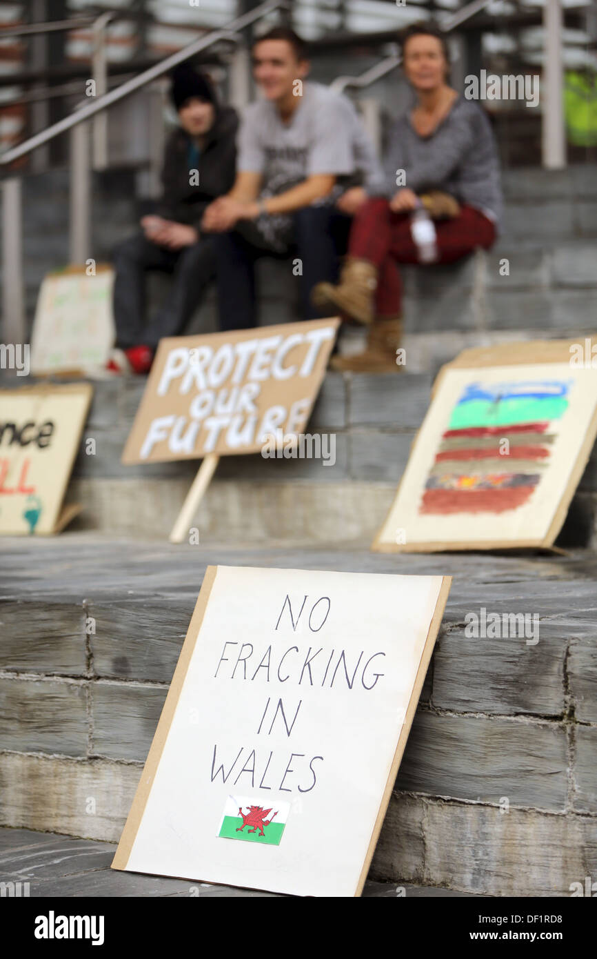 Placards on the steps of the Senedd at the anti-fracking demonstration ...