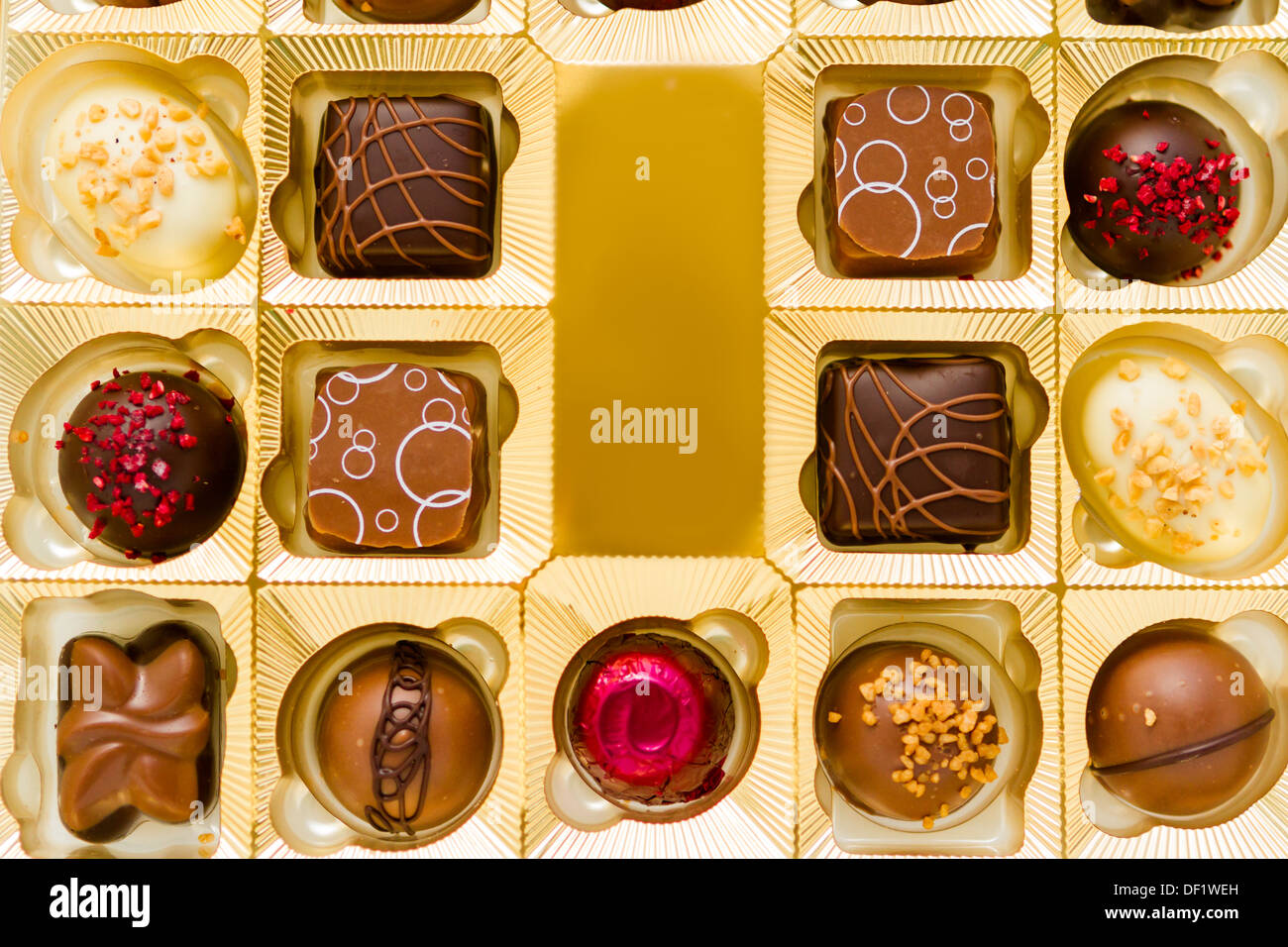 Assortedgourmet chocolate candies in different shapes and colors Stock ...