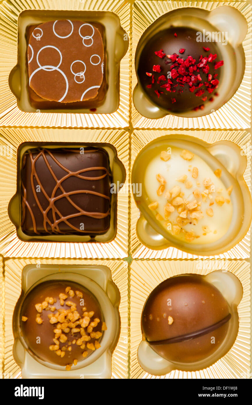 Assortedgourmet chocolate candies in different shapes and colors Stock ...