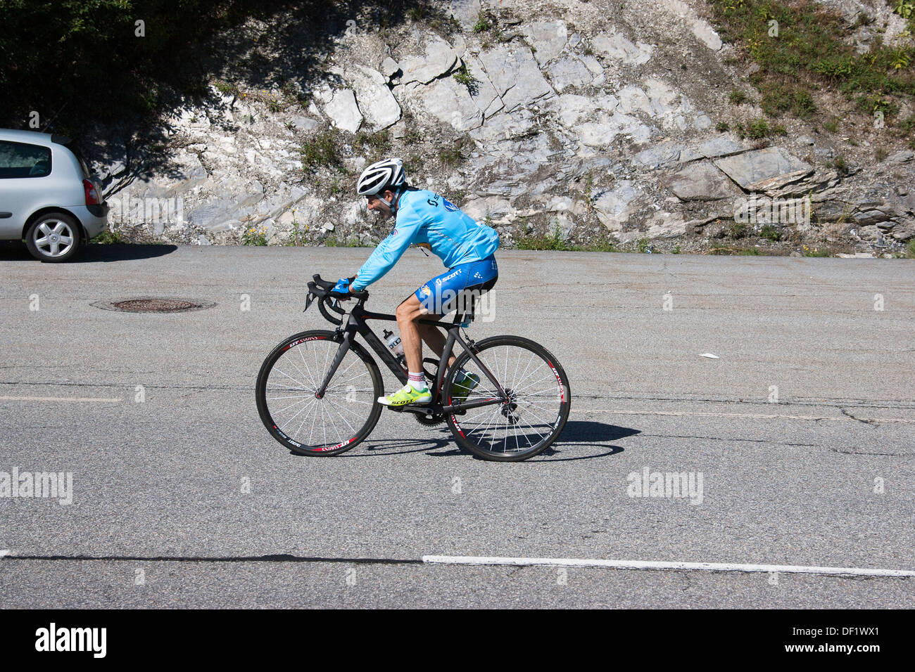 cyclist riding determined rock face pedaling pedal Stock Photo - Alamy