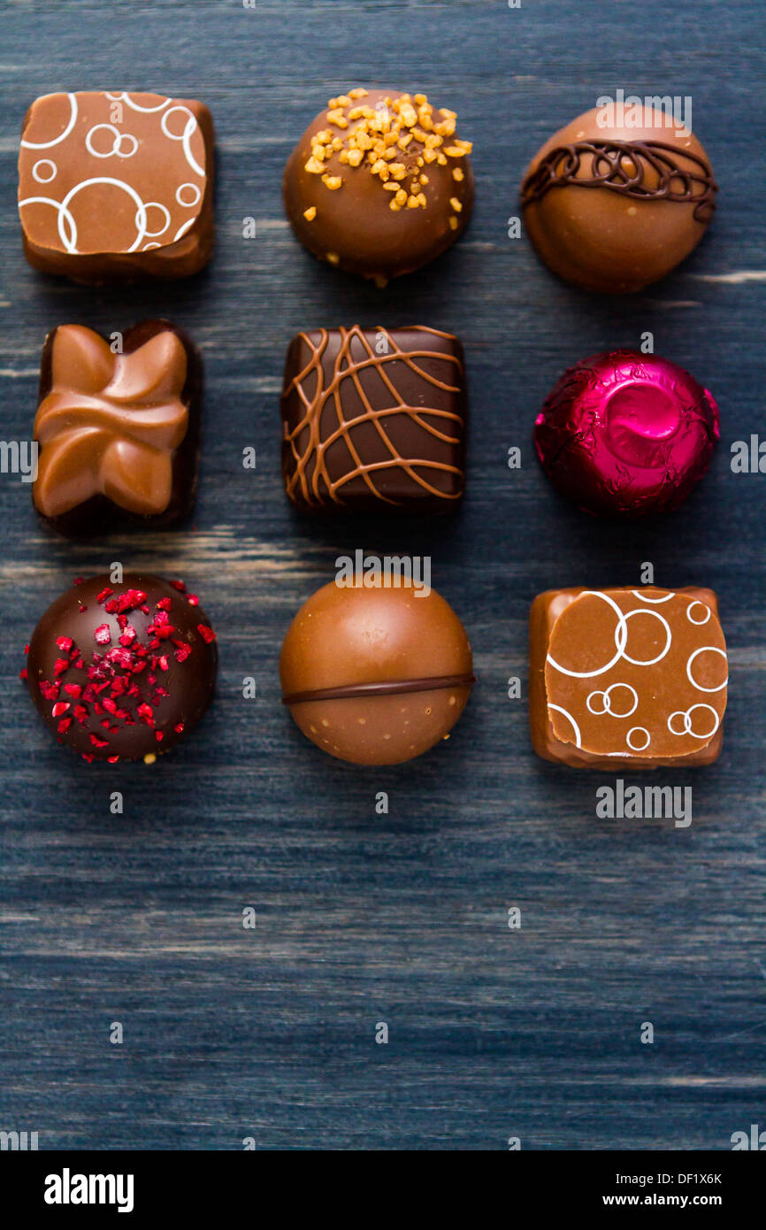 Assortedgourmet chocolate candies in different shapes and colors Stock ...