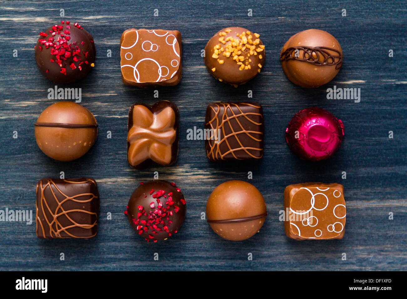 Assortedgourmet chocolate candies in different shapes and colors Stock ...
