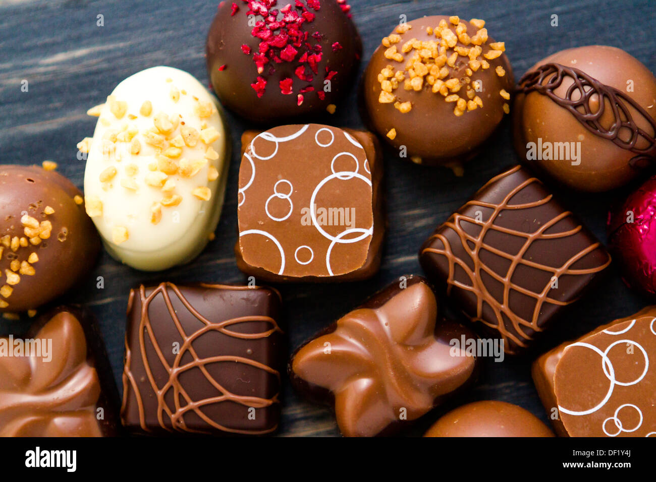 Assortedgourmet chocolate candies in different shapes and colors Stock ...