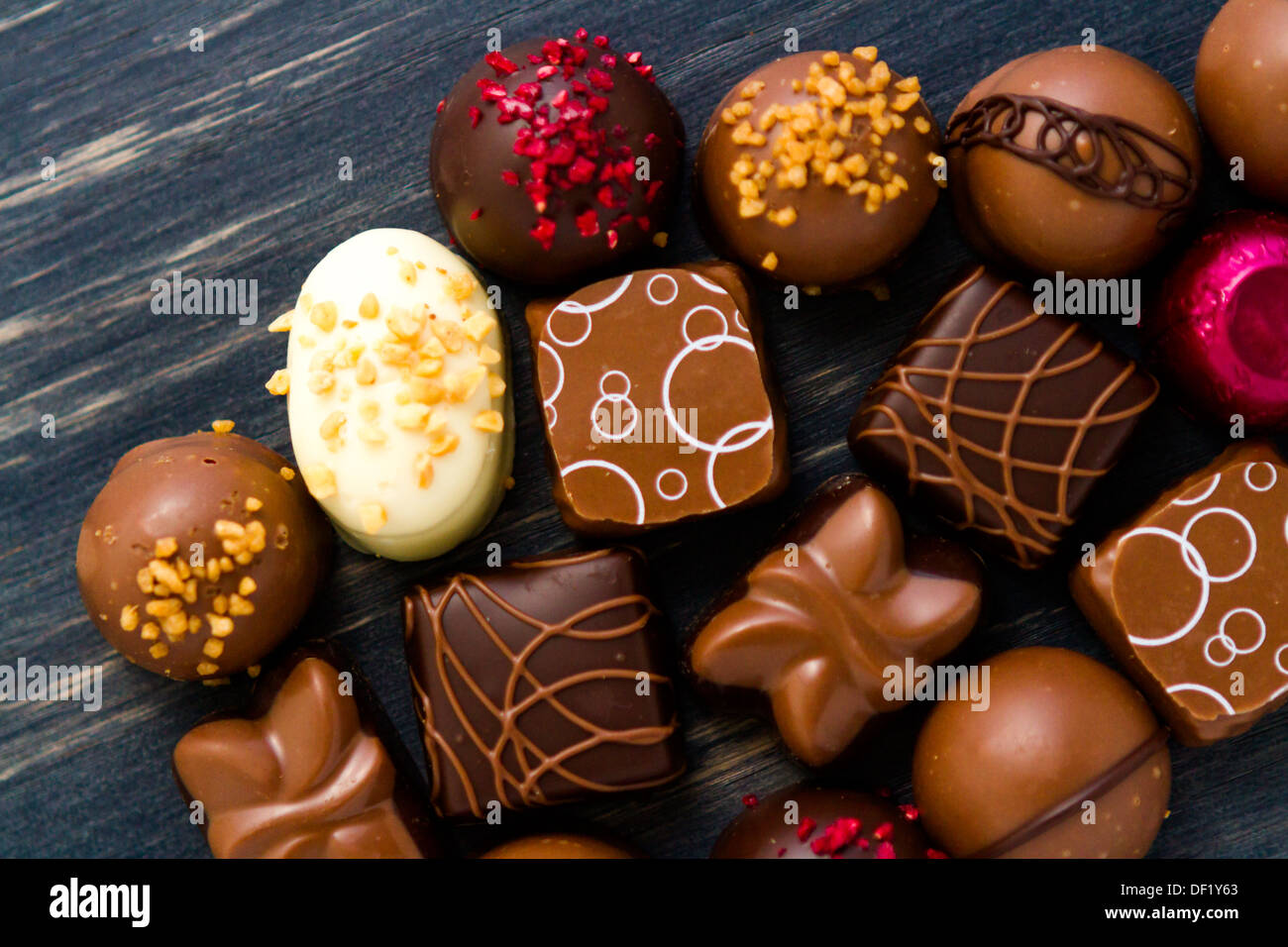 Assortedgourmet chocolate candies in different shapes and colors Stock ...
