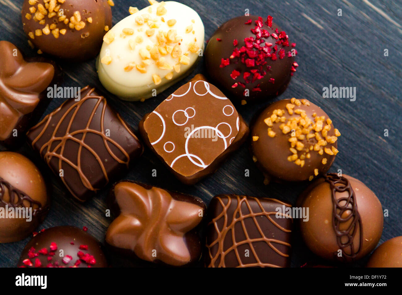 Assortedgourmet chocolate candies in different shapes and colors Stock ...
