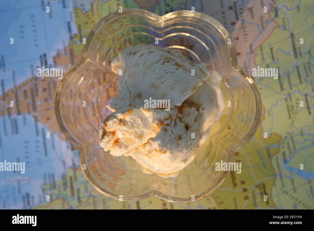 Honeycomb ice cream on a map of the world Stock Photo - Alamy