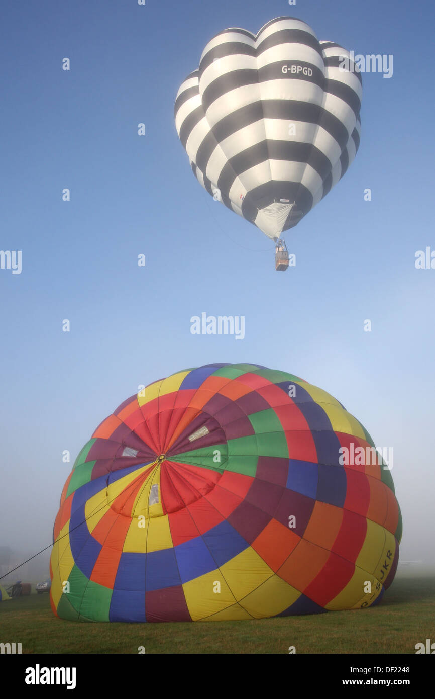Hot air balloon being inflated Stock Photo - Alamy