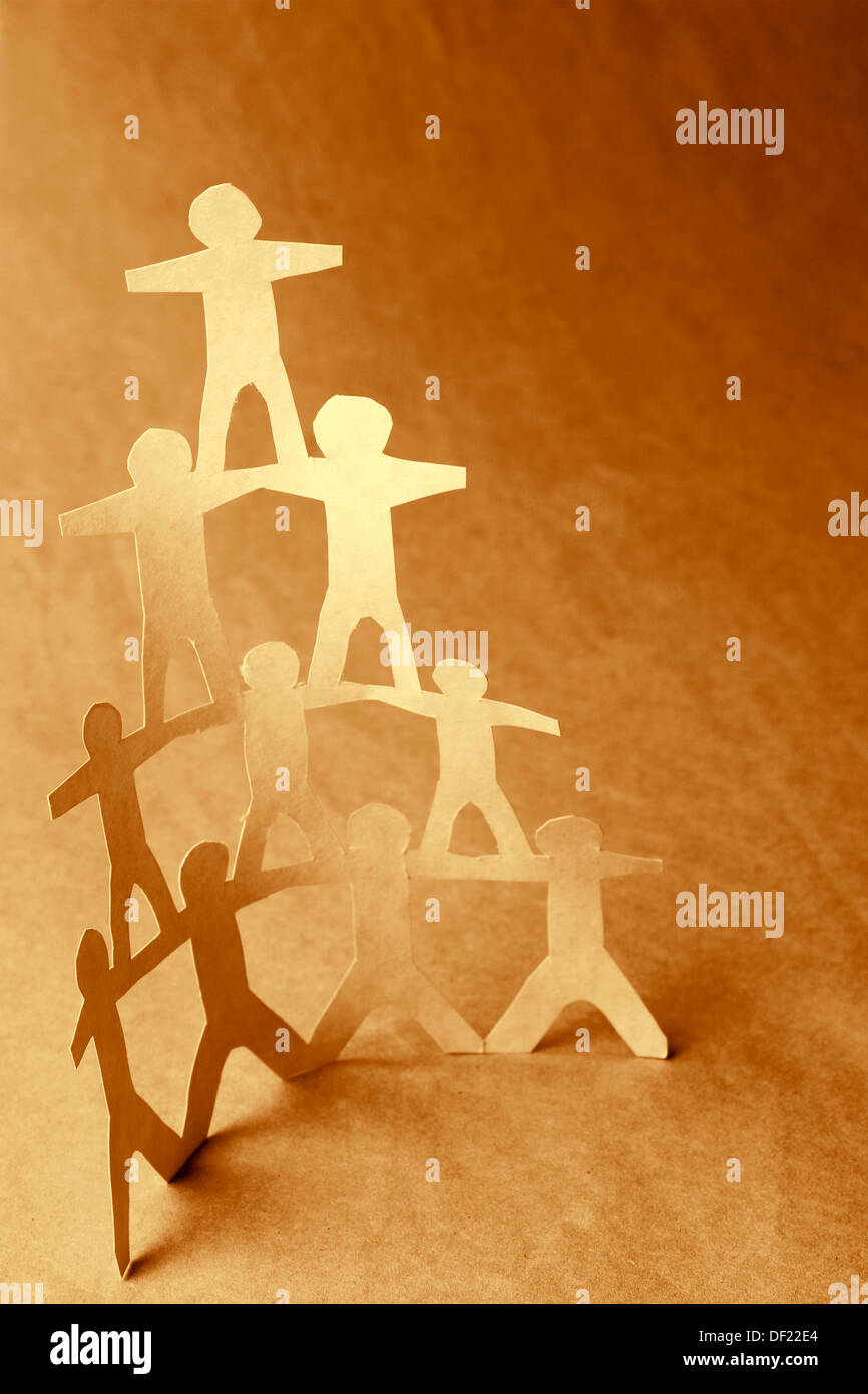 Human team pyramid. Team building Stock Photo - Alamy