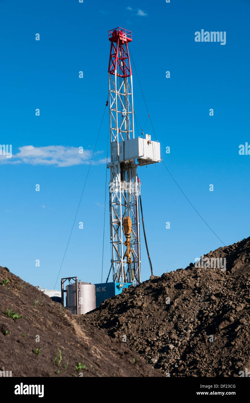A working drill rig belonging to Chinook Energy drills for natural gas ...