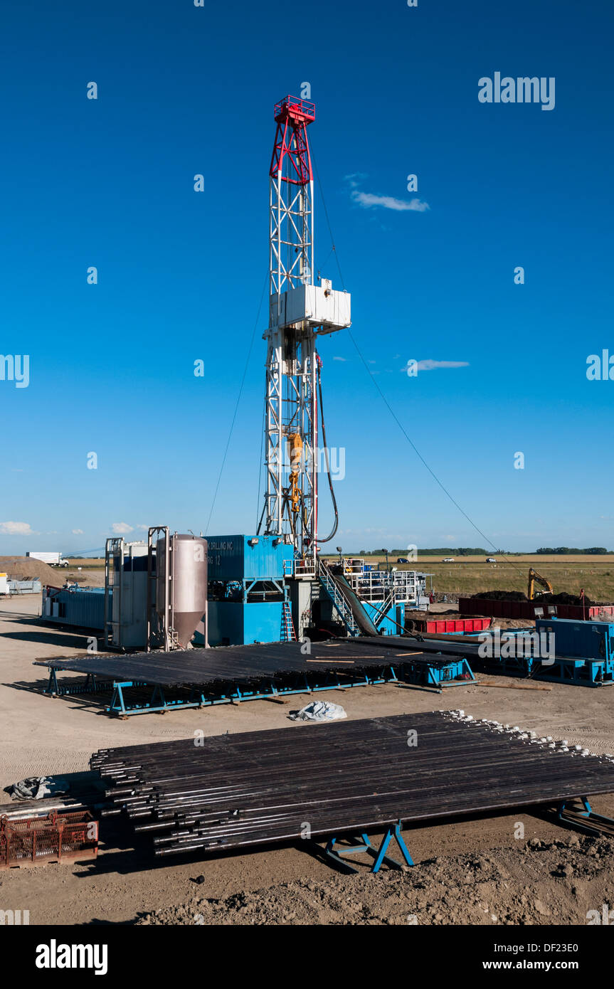 A working drill rig belonging to Chinook Energy drills for natural gas ...