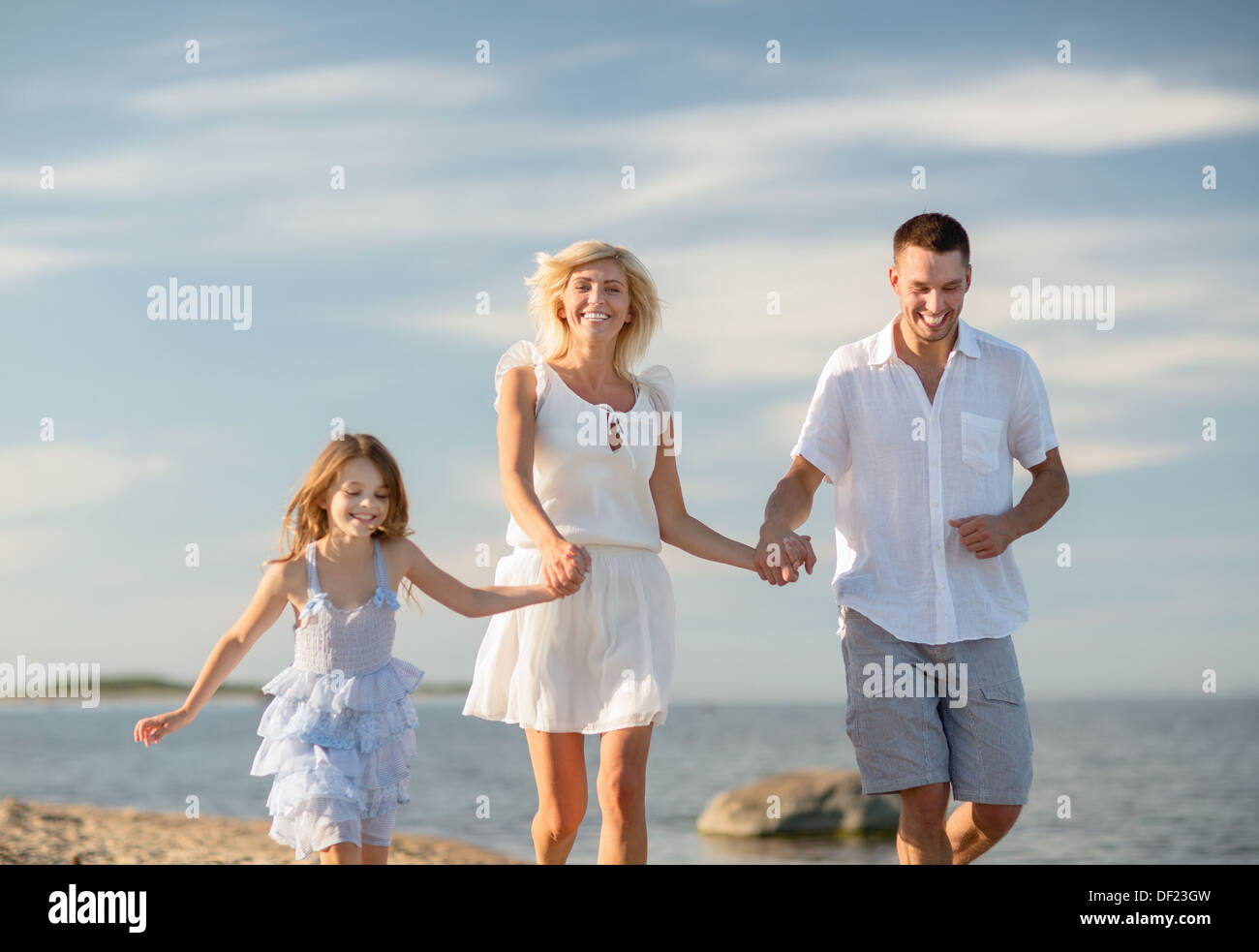 happy family at the seaside Stock Photo - Alamy