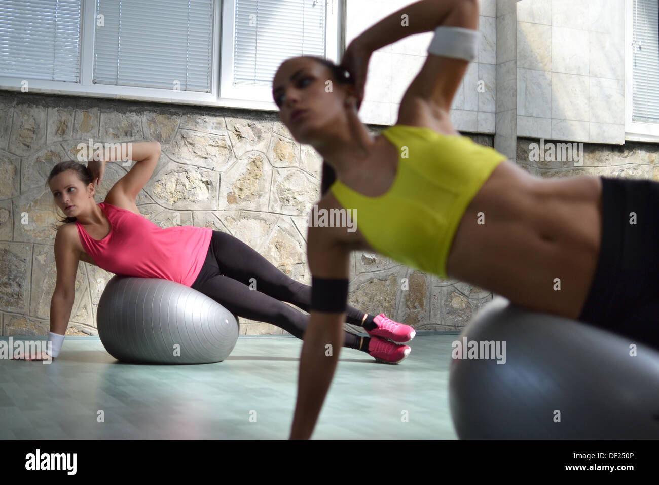 working out in the fitness studio Stock Photo - Alamy