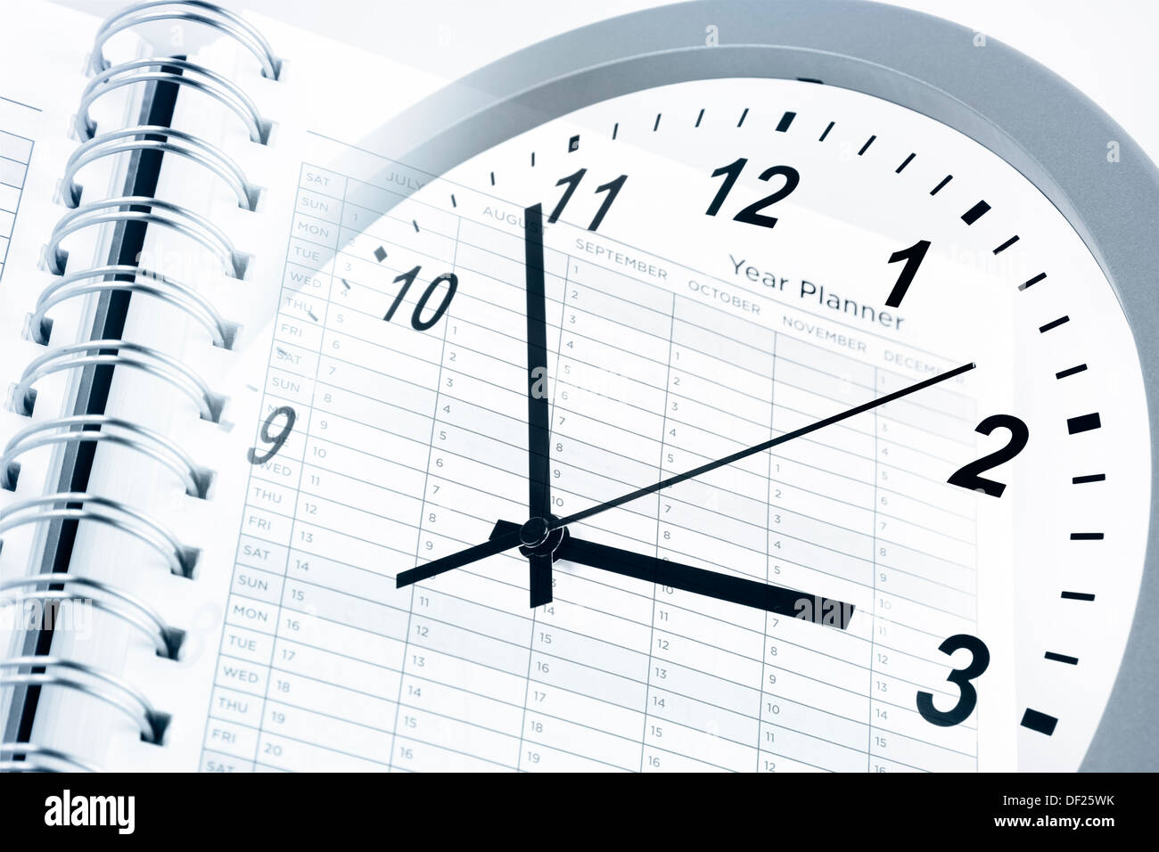 Clock face and year planner Stock Photo - Alamy