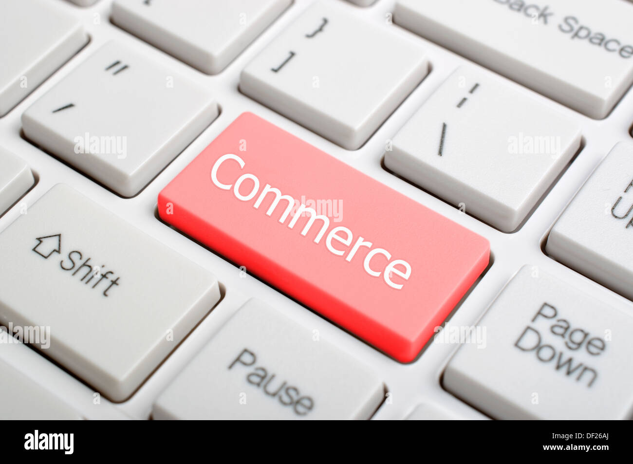 Commerce key on keyboard Stock Photo - Alamy