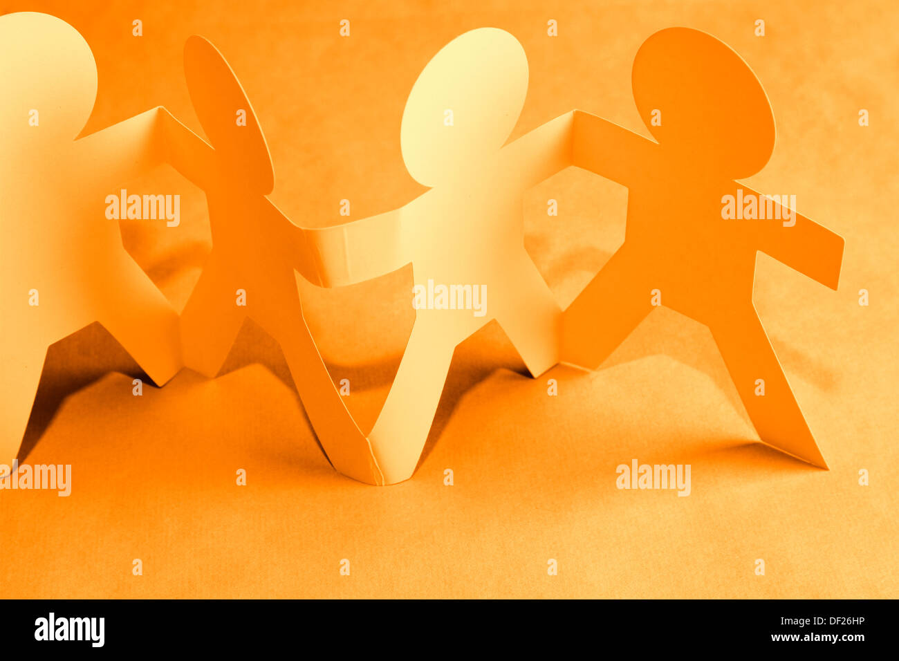 Team of paper doll people Stock Photo - Alamy