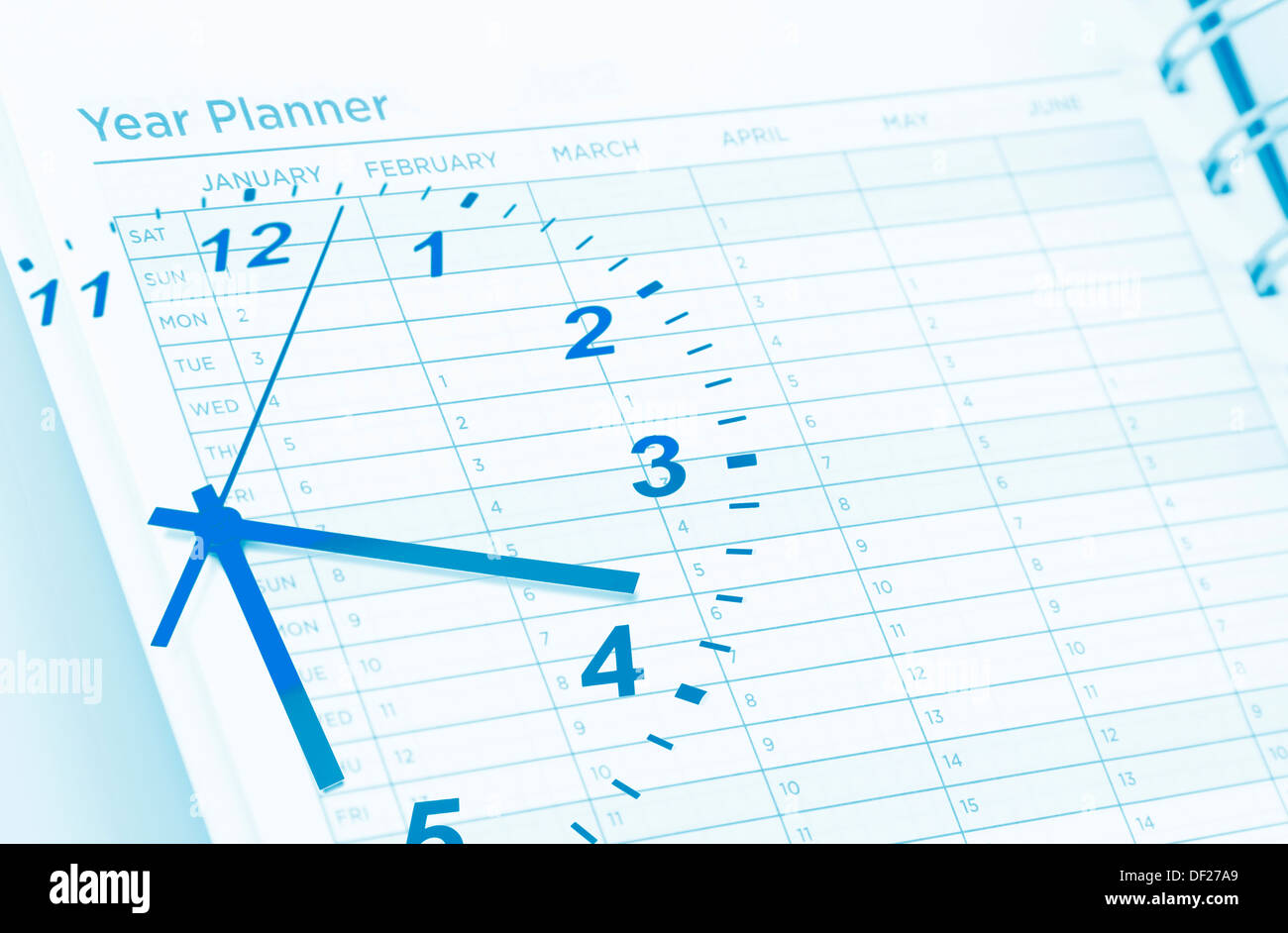 Clock face and year planner Stock Photo - Alamy