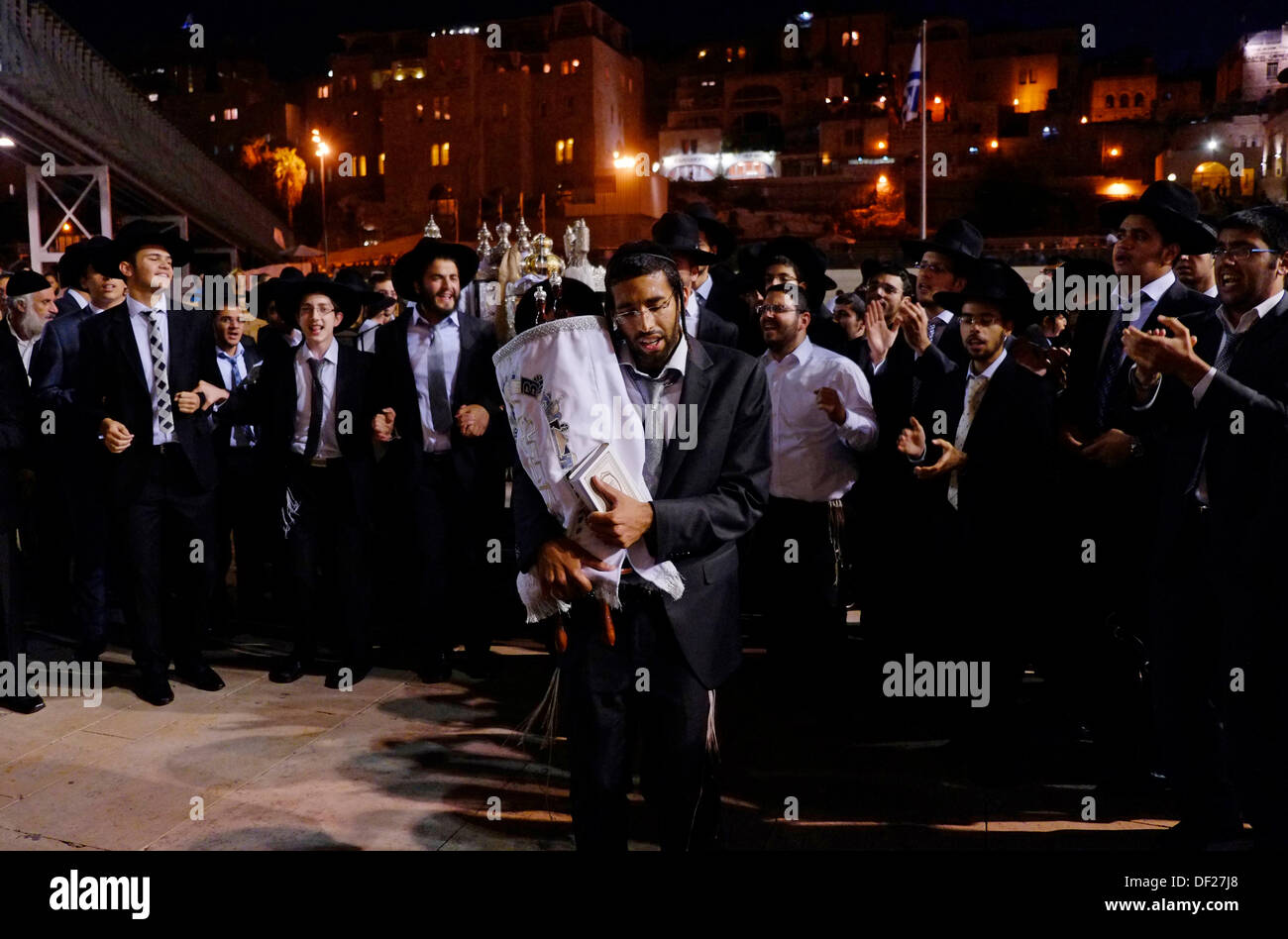 Ultra Orthodox Religious Jewish men dancing with scrolls of Torah as ...