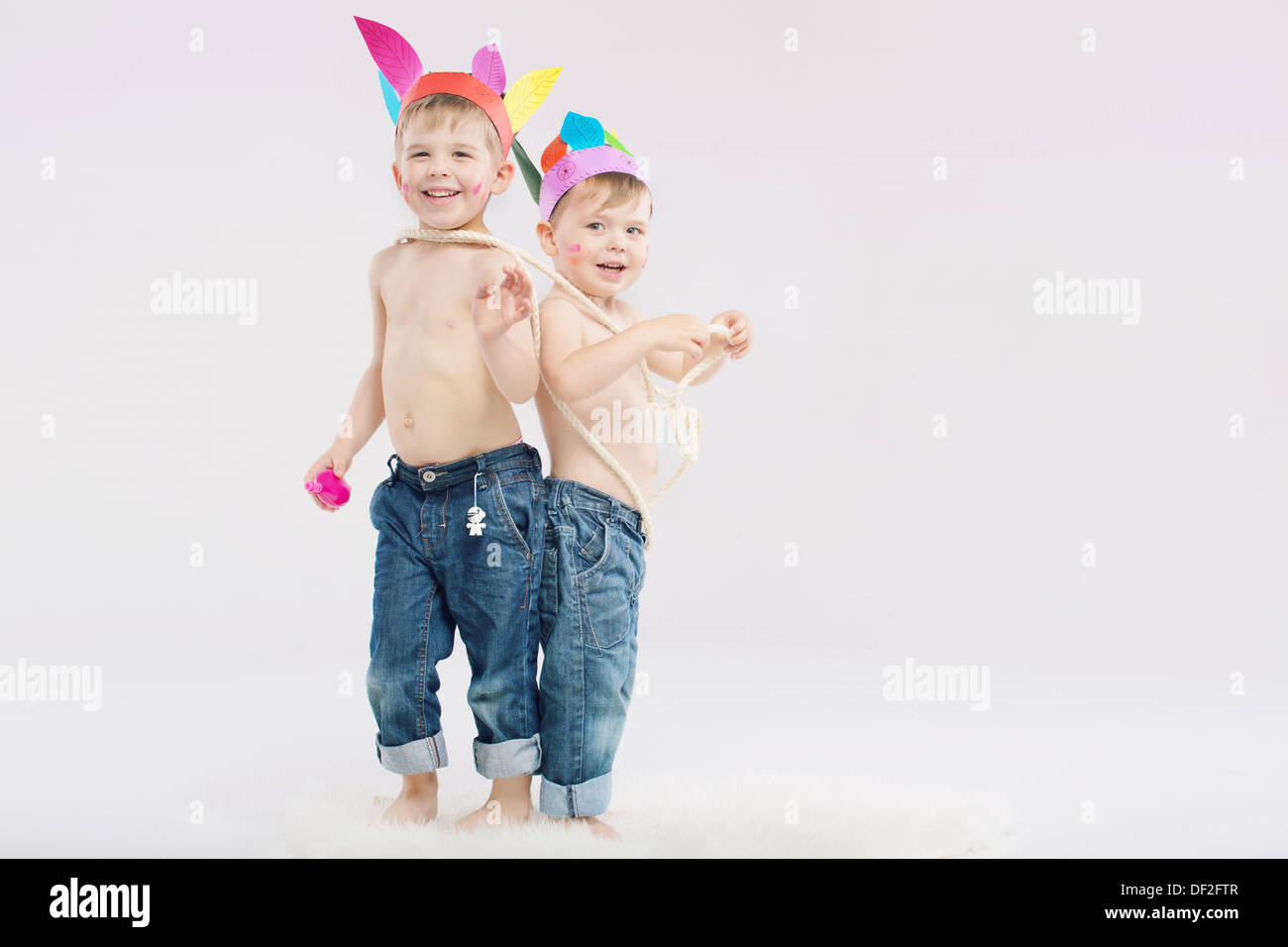 Two brave kids playing Indians Stock Photo - Alamy