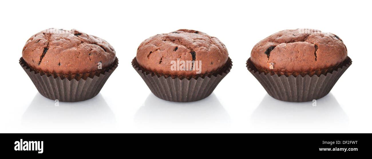 Homemade muffins in row isolated on white background Stock Photo - Alamy