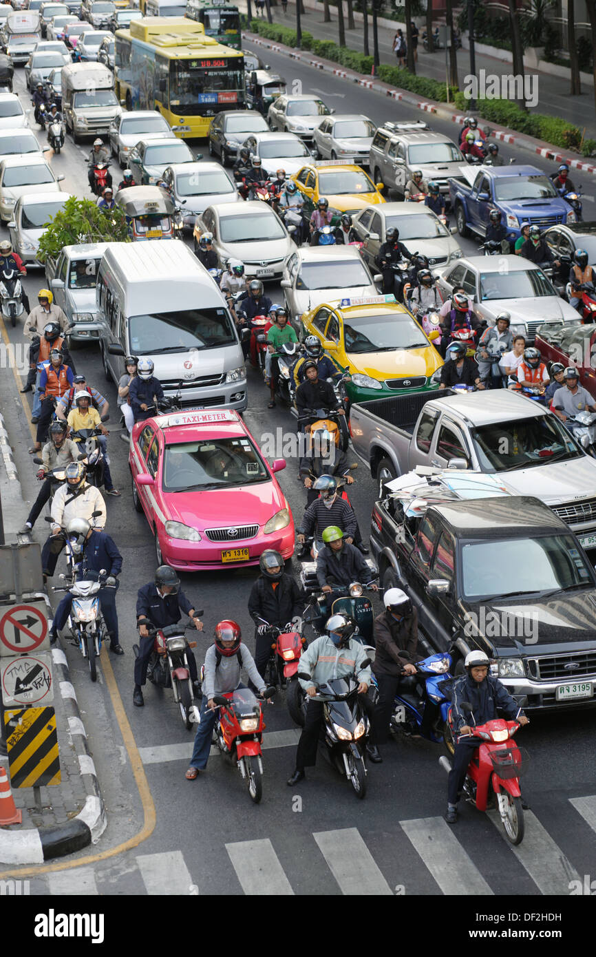 Traffic jam - cars and motorcycle waiting at a red light on Stock Photo ...