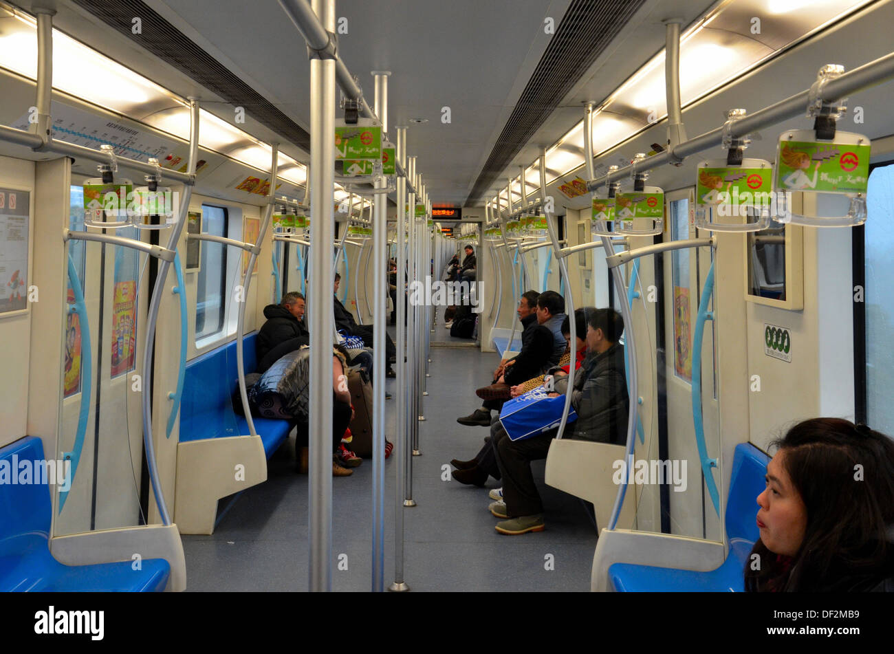 Commuters inside shanghai metro train hi-res stock photography and ...
