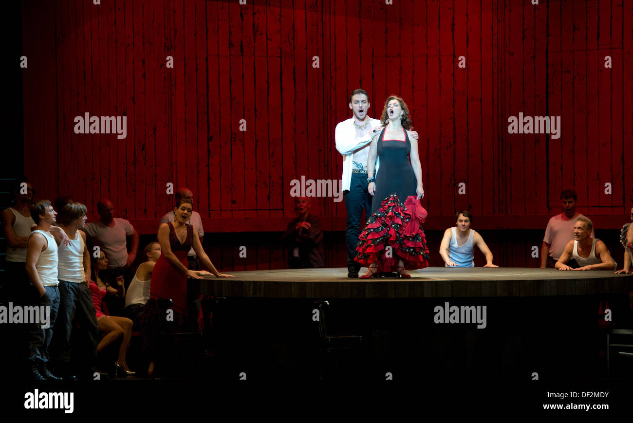 Anke Vondung as Carmen and Kostas Smoriginas as Escamillo performs ...
