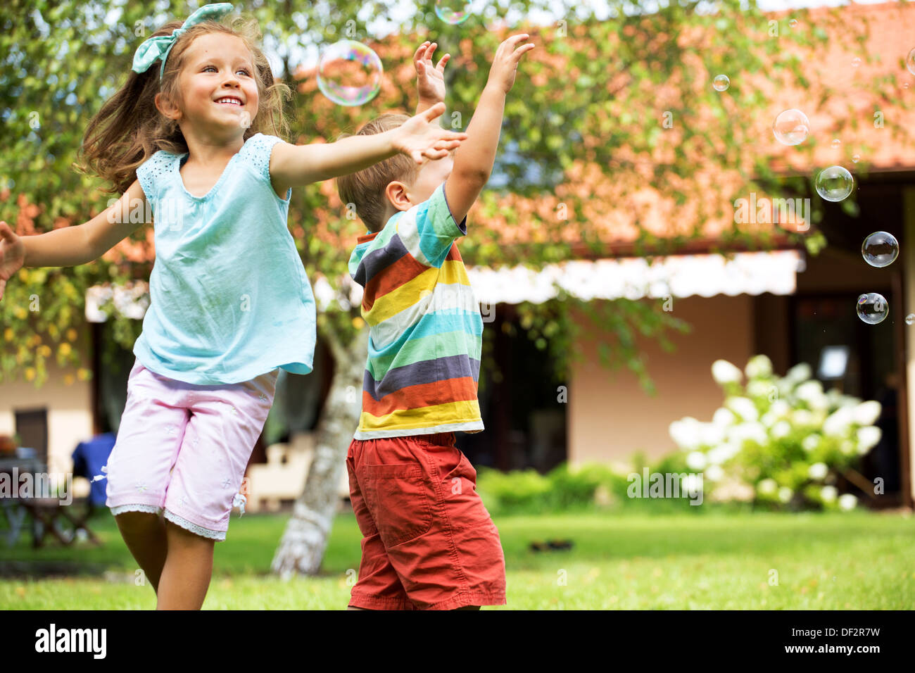 Boy chasing girl hi-res stock photography and images - Alamy