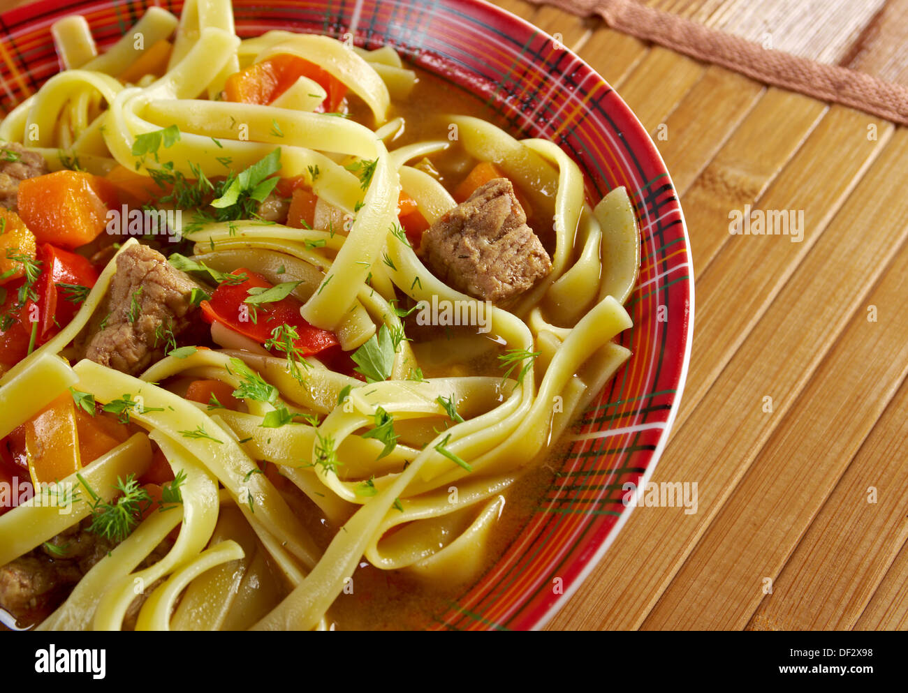 oriental uzbek soup lagman .farm-style Stock Photo - Alamy