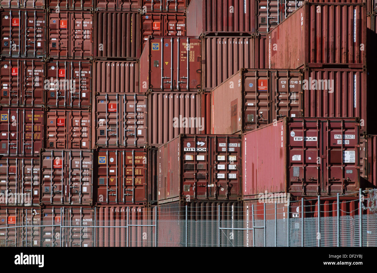Shipping containers in storage yard Stock Photo - Alamy