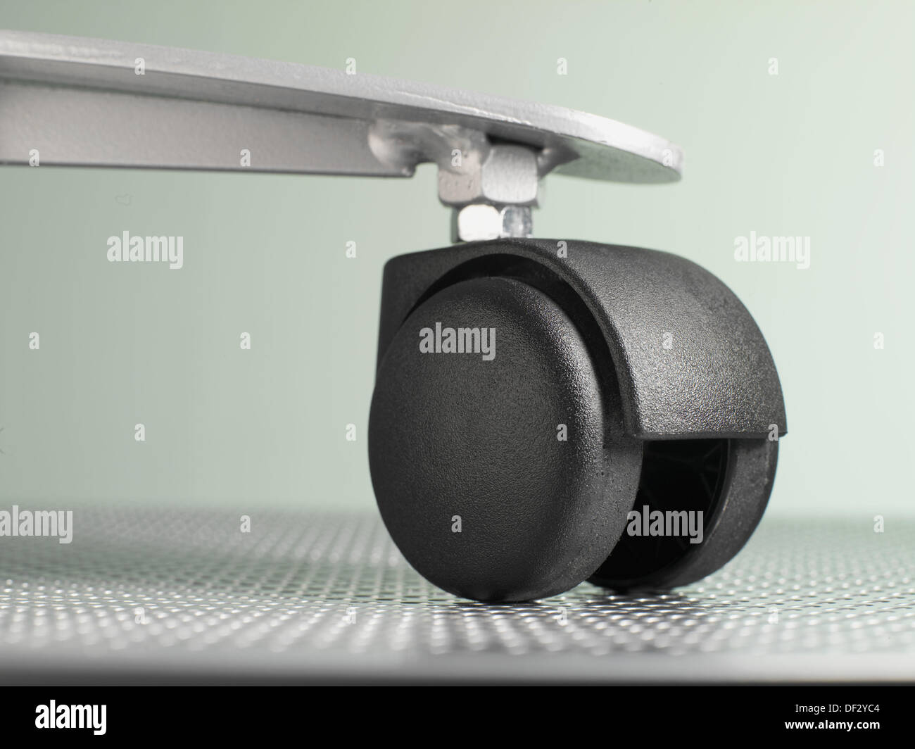 office chair wheel close-up Stock Photo - Alamy