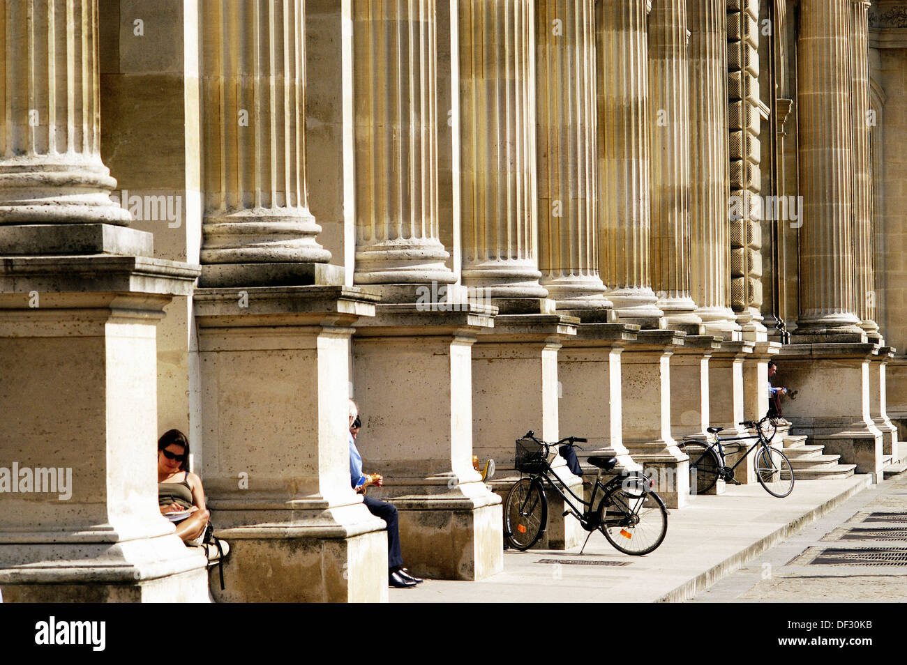 Bikes against columns at the Louvre. Paris. France Stock Photo - Alamy