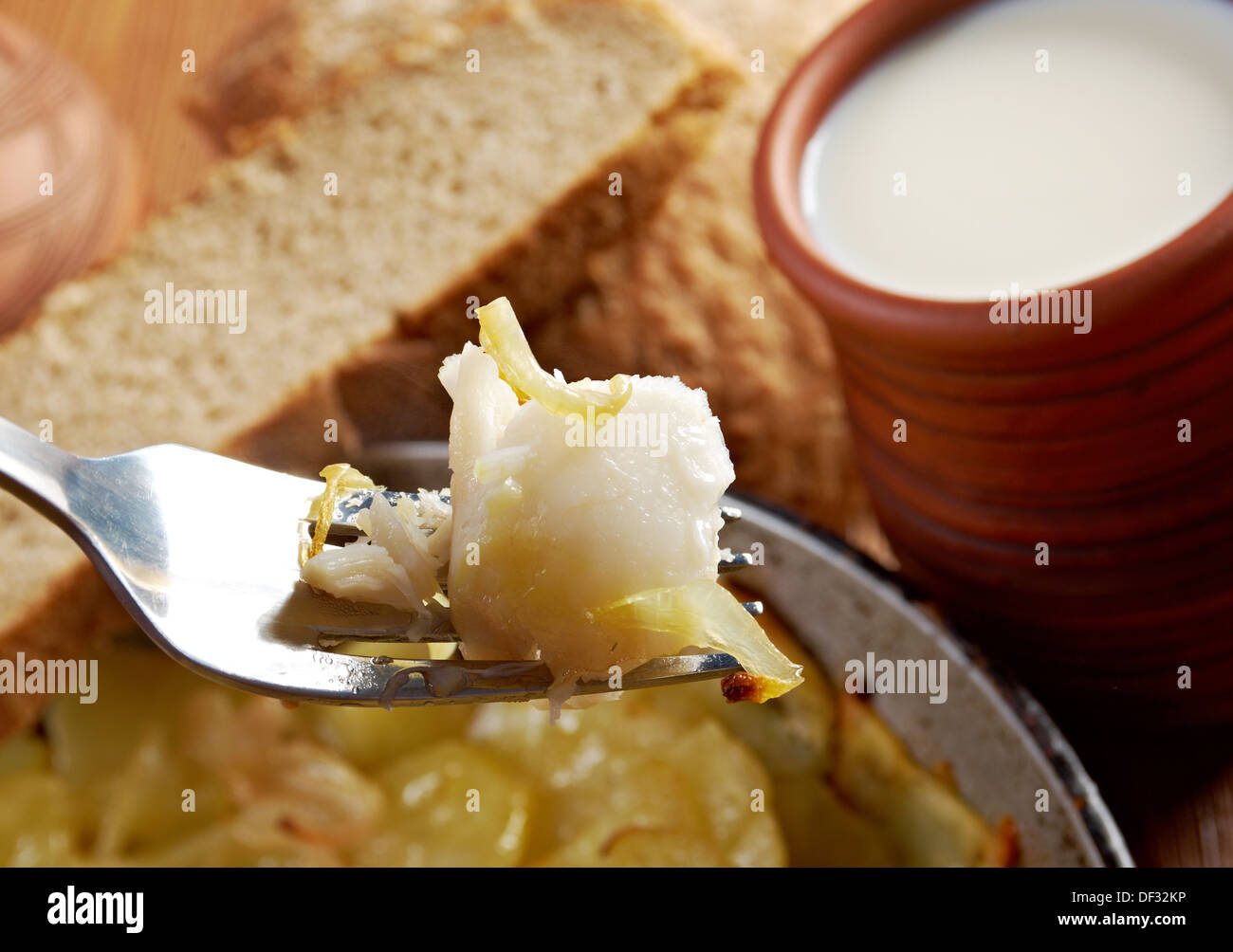 Baked cod potatoes onions hi-res stock photography and images - Alamy