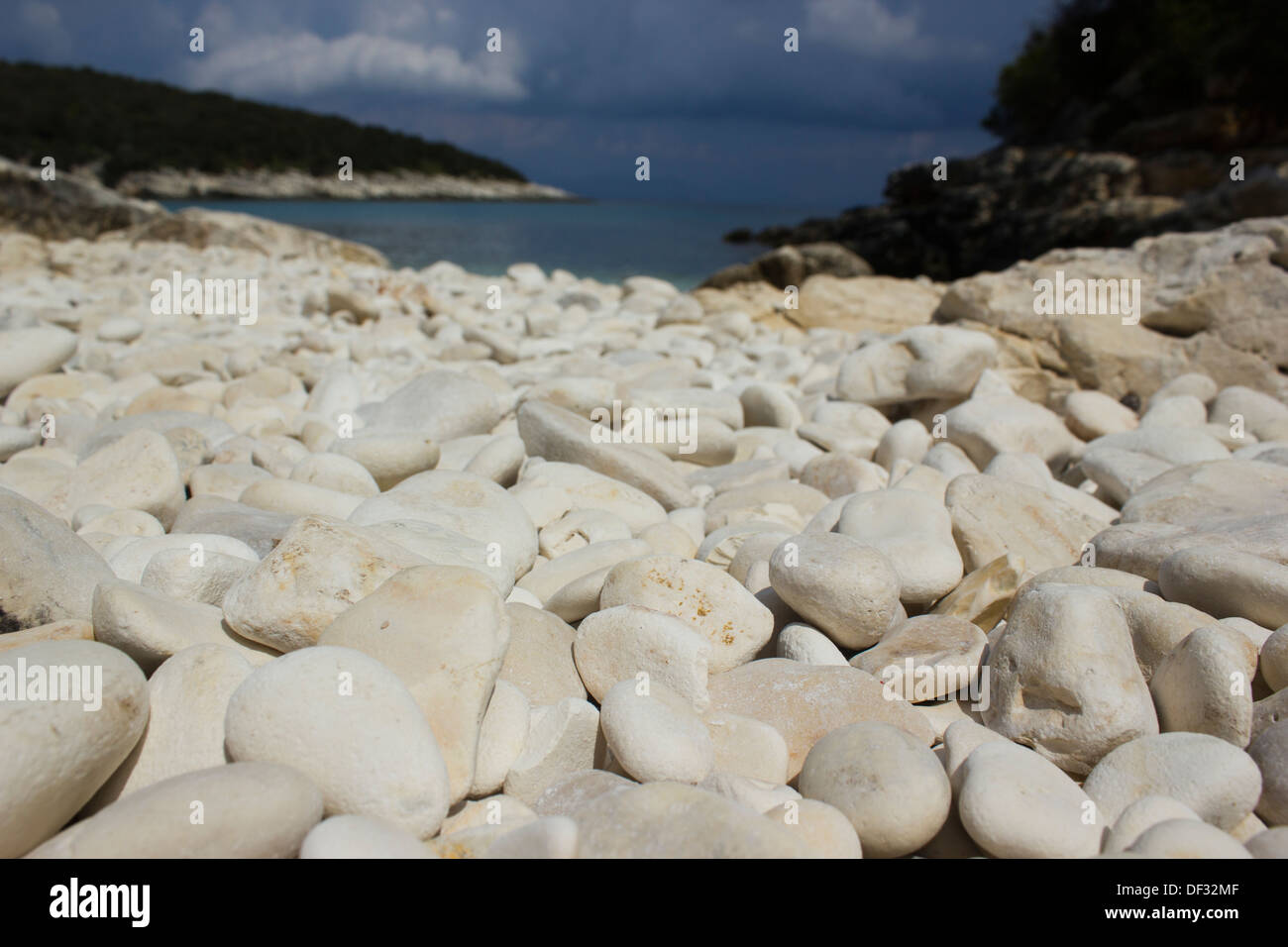 Secluded Stone Beach Stock Photo - Alamy